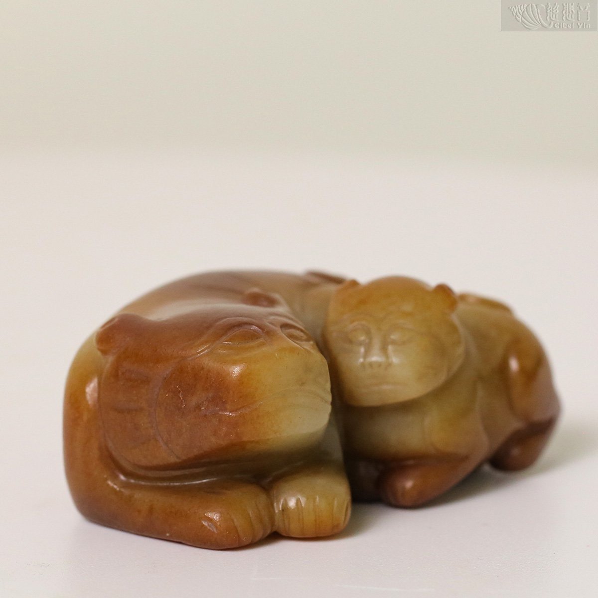 A Yellow and Russet Jade 'Tiger and Cub' Group CiBeiYin